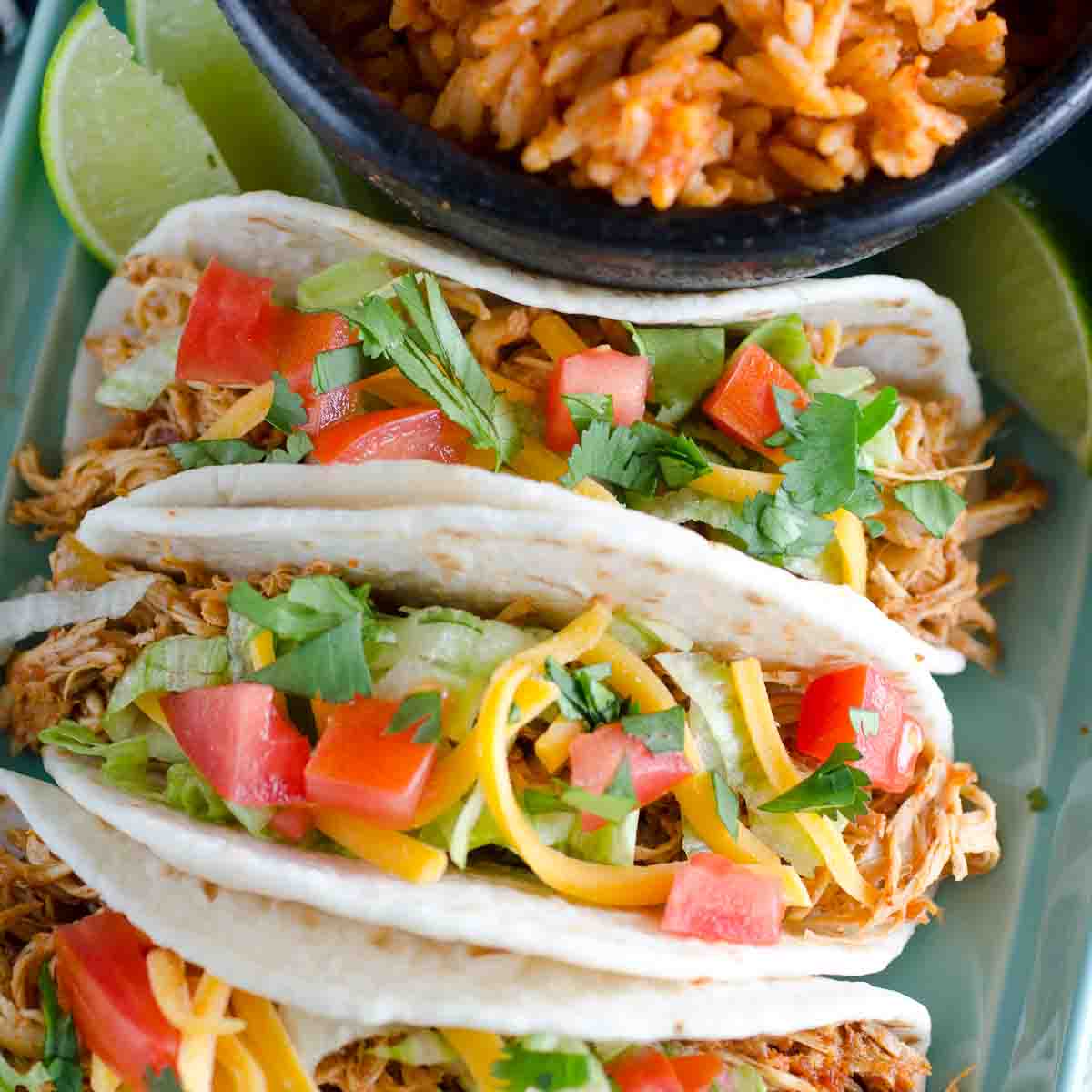 Crockpot Chicken Tacos - Ready in just 1-2-3. Great for Cinco-de-Mayo!